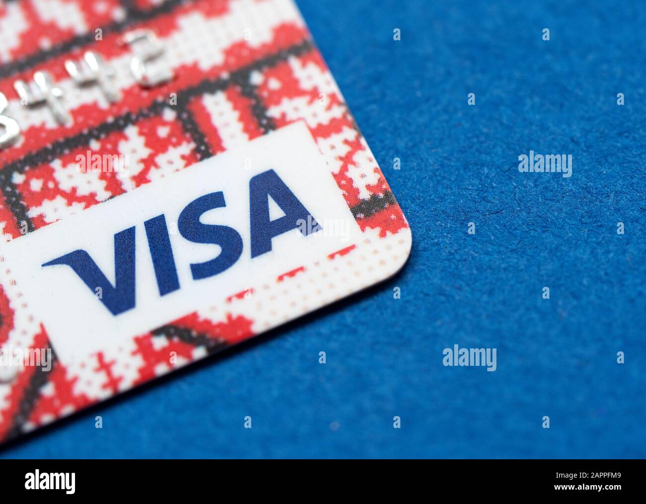Visa bank card on a dark blue background Stock Photo - Alamy