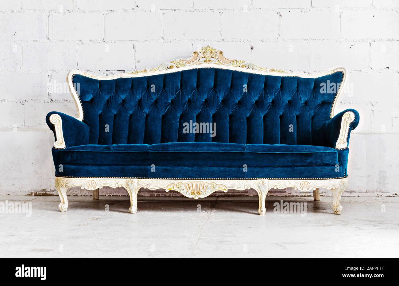Blue classical style sofa couch in vintage room Stock Photo - Alamy