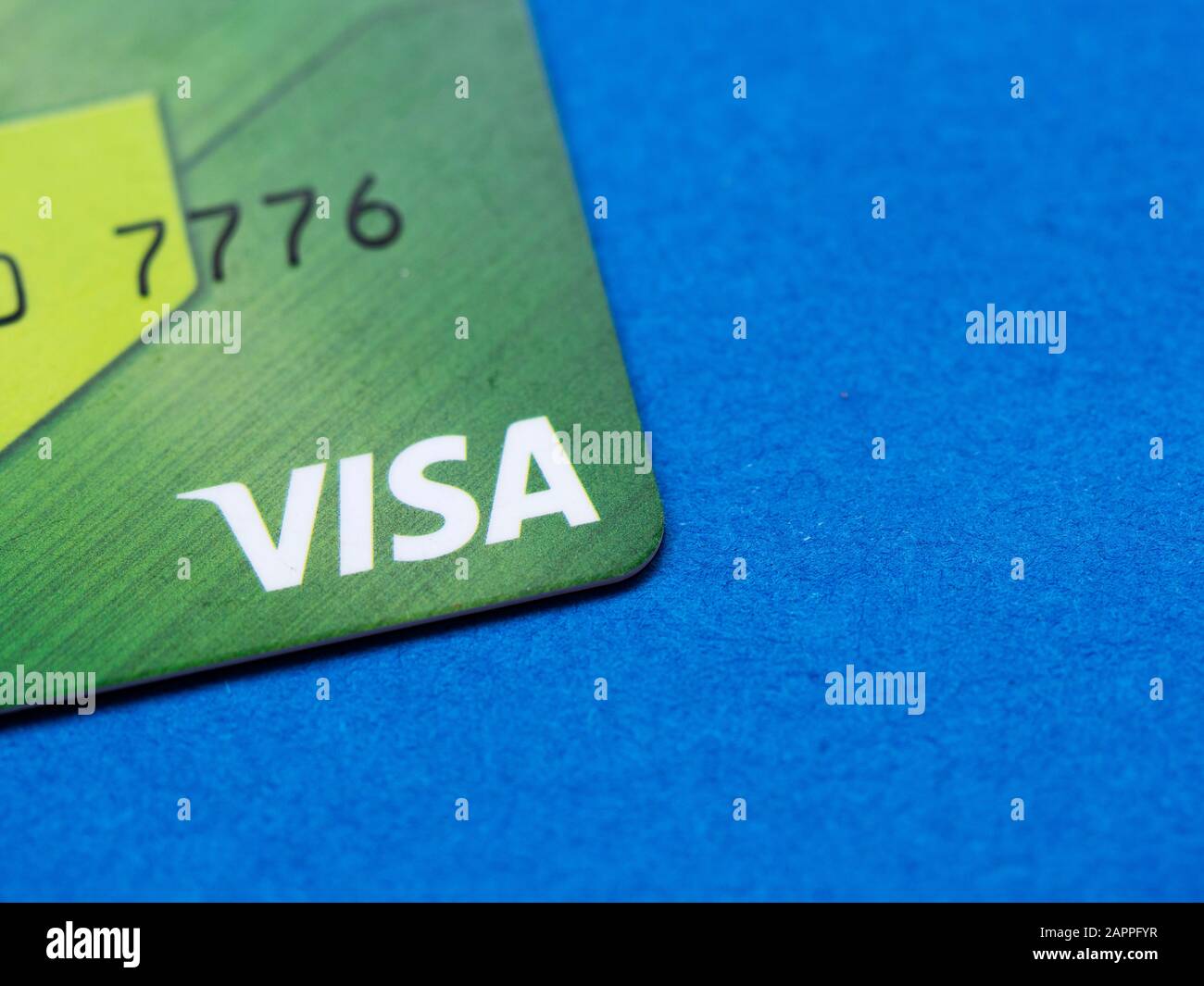 Visa bank card on a dark blue background Stock Photo - Alamy