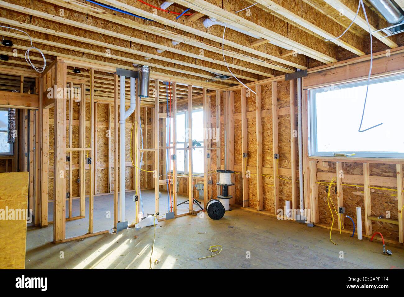 Interior with wood framing beam of new house under construction Stock ...