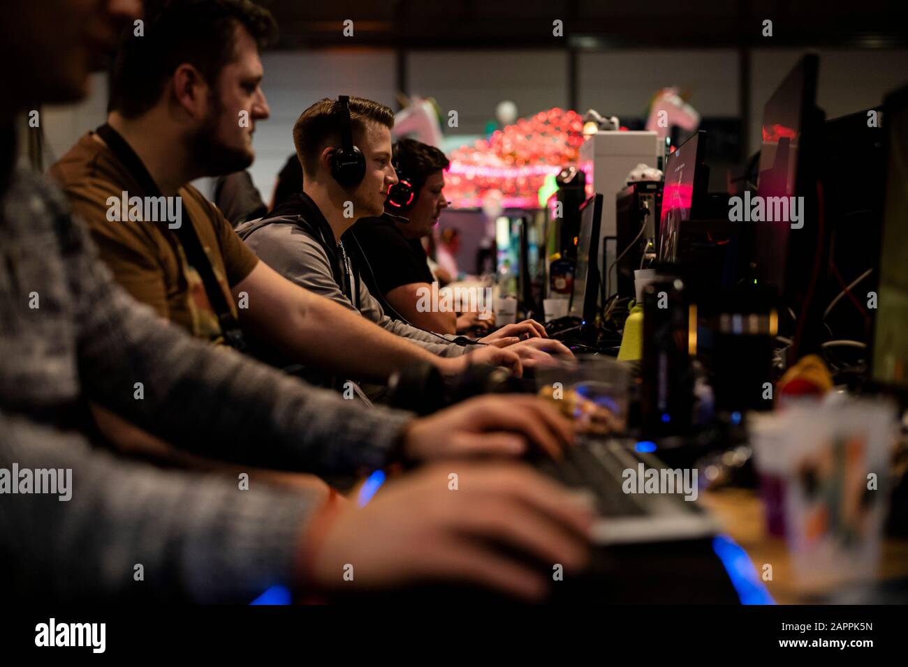 Leipzig, Germany. 24th Jan, 2020. Computer players look at their ...