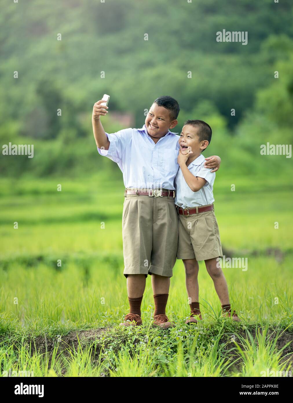 Two boys do selfie Stock Photo - Alamy