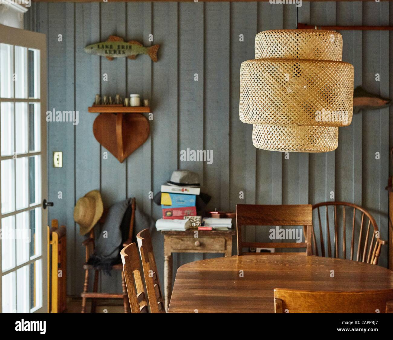 Peaceful scene of dining room in a lakeside cabin Stock Photo - Alamy