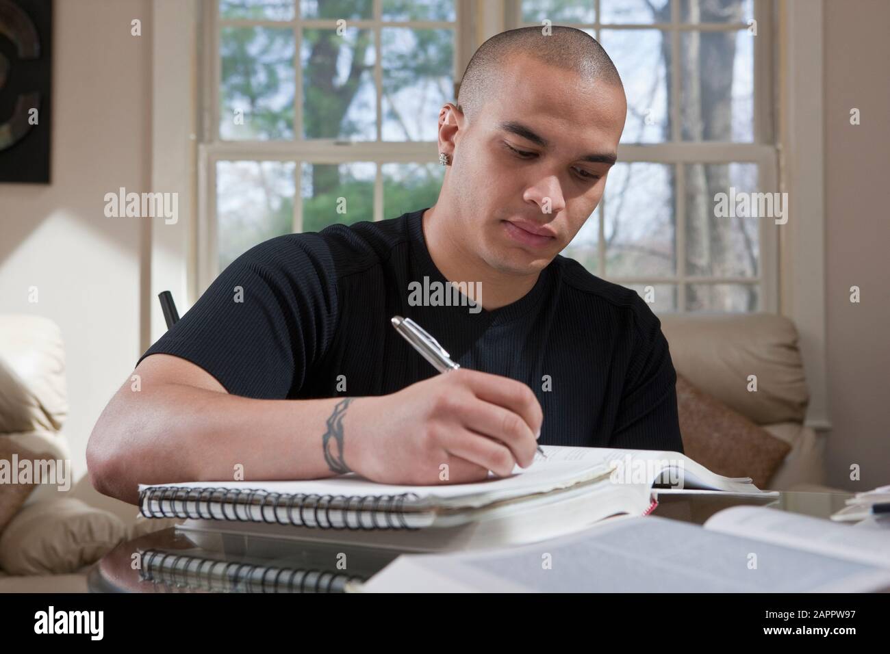 Making notes in a textbook hi-res stock photography and images - Alamy