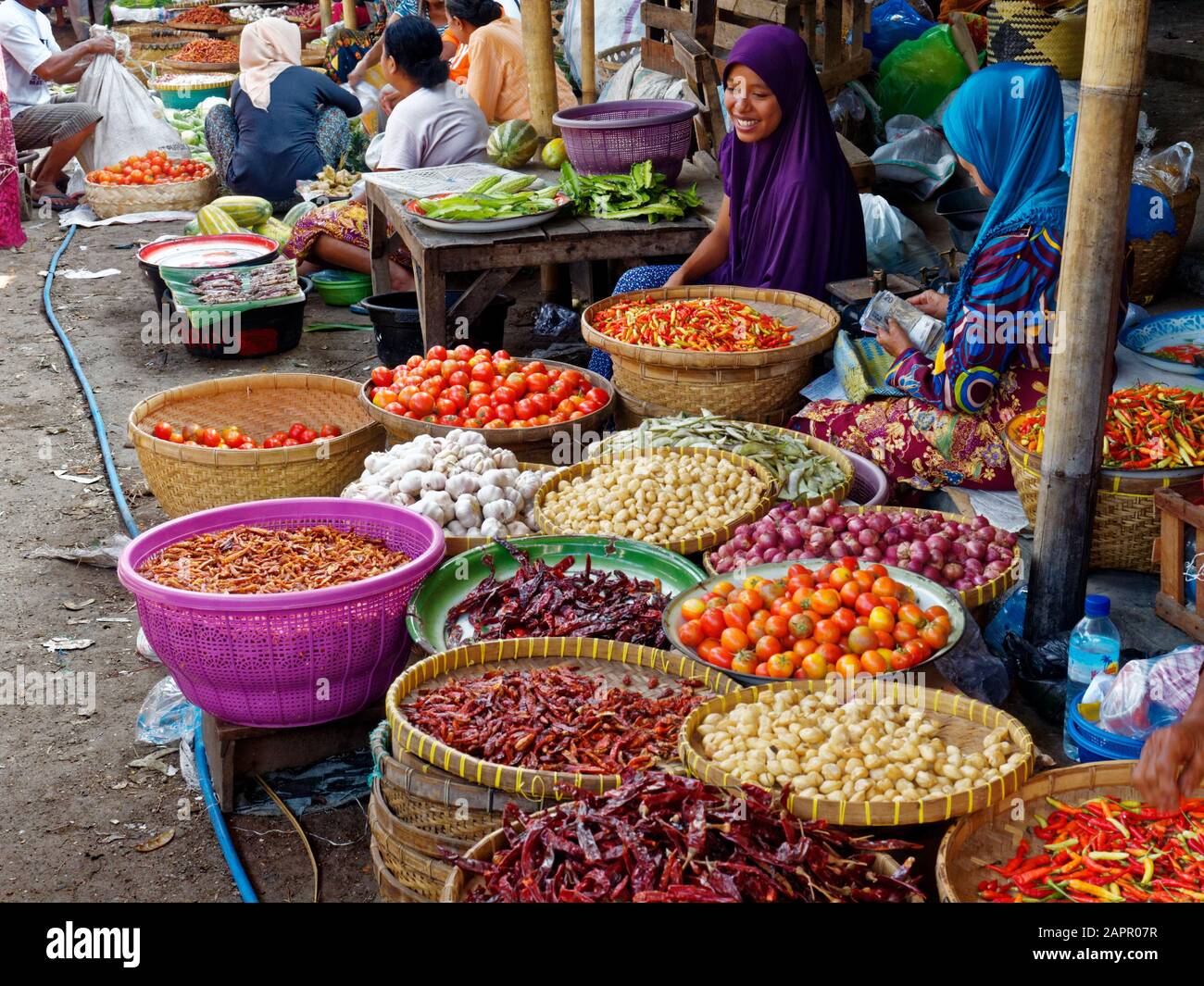 Vegetable seller at market, Lombok island, Indonesia, Asia Stock Photo ...