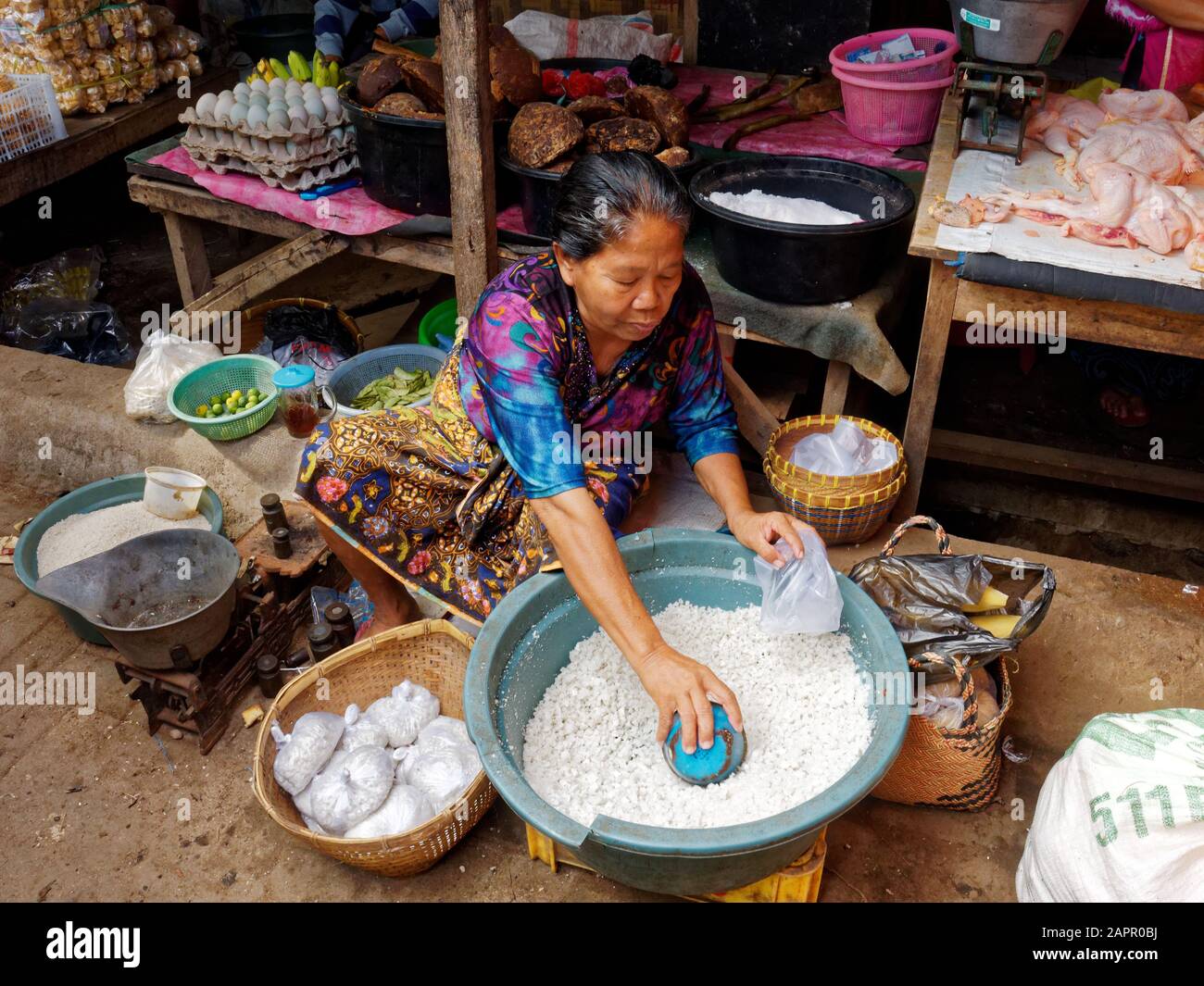 Salt seller at market, Lombok island, Indonesia, Asia Stock Photo - Alamy