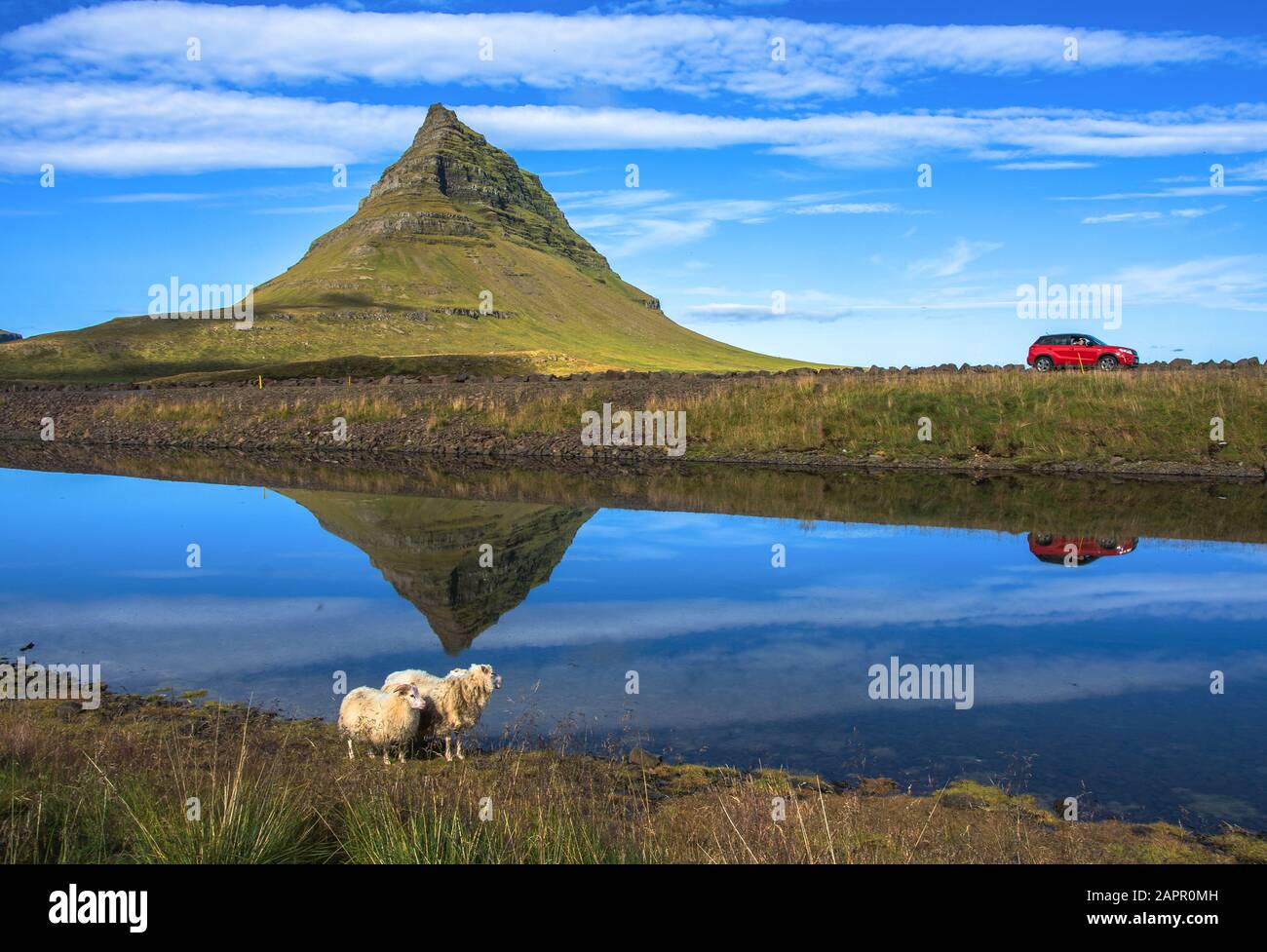 Summer sunset over the famous Kirkjufellsfoss Waterfall with Kirkjufell ... Summer sunset over the famous Kirkjufellsfoss Waterfall with Kirkjufell ...