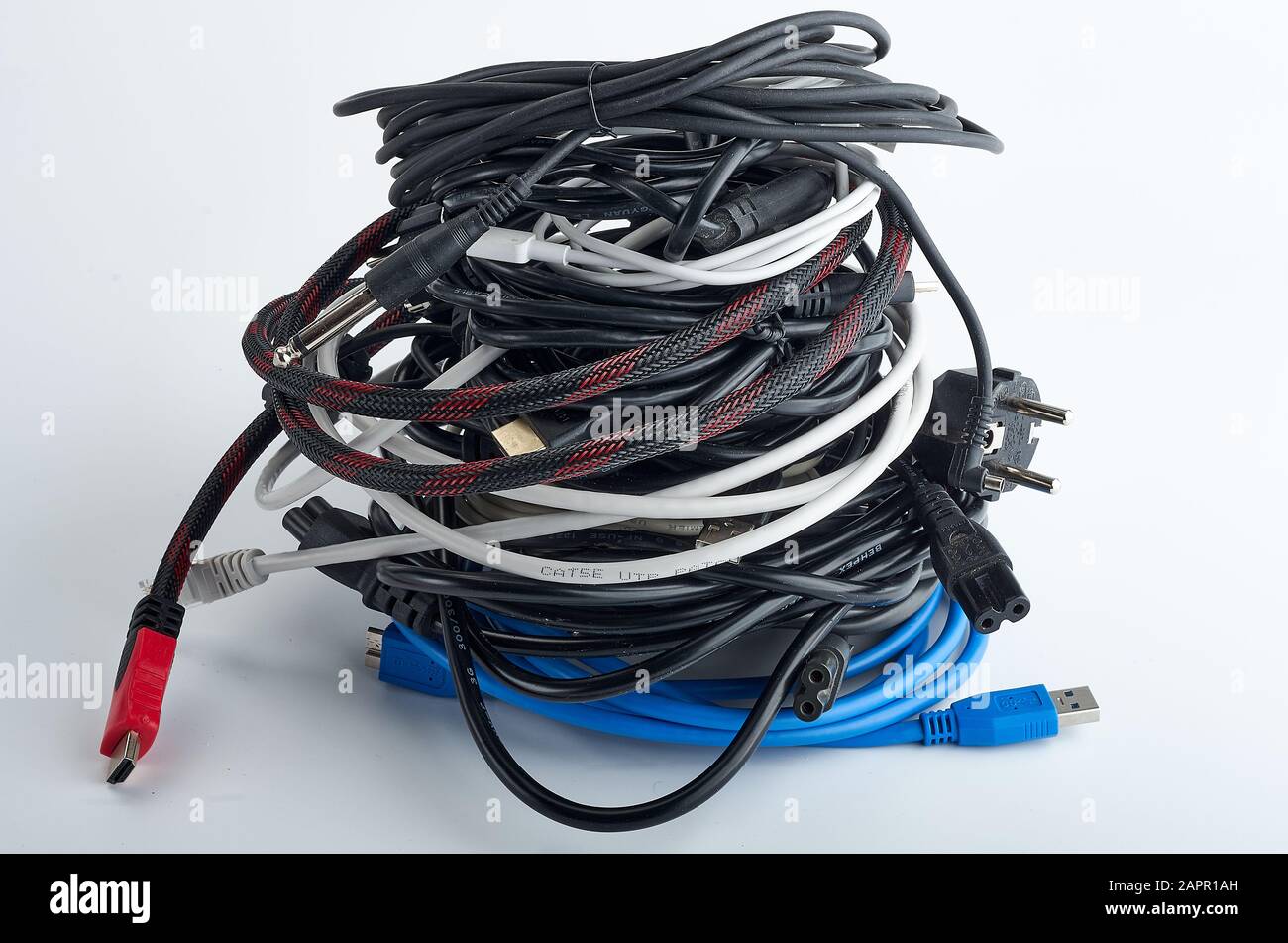 Old, dusty, used, wires, for the computer, tangled, in a skein ...