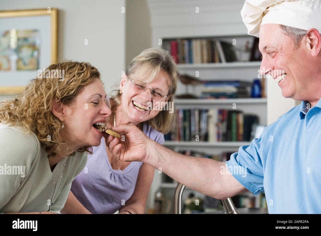 Cookie tempting women hi-res stock photography and images - Alamy