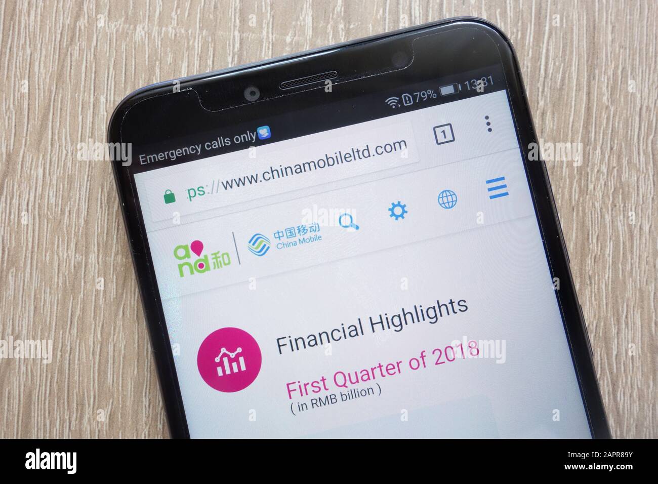 China Mobile Communications website displayed on a modern smartphone ...