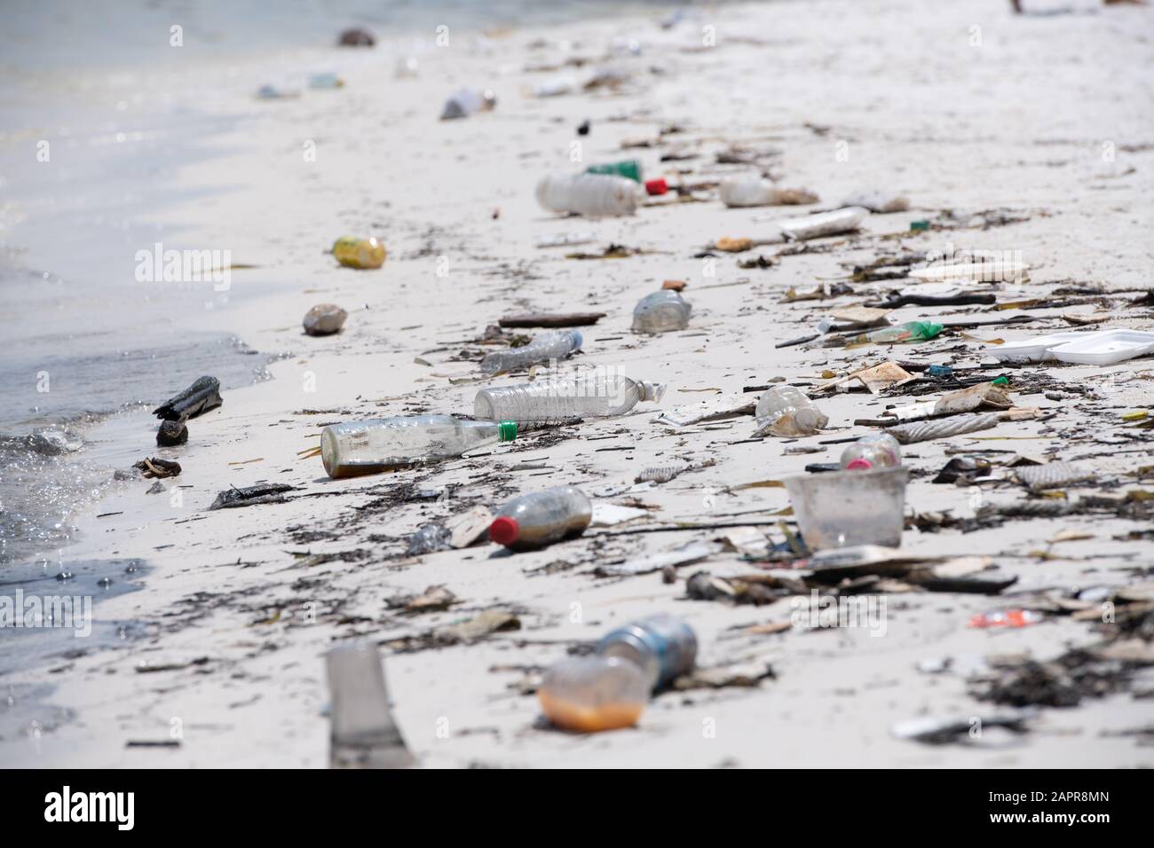 Plastic washed up on Beach Stock Photo - Alamy