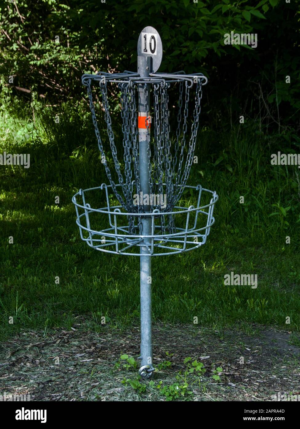 Disc golf basket target, Heritage Park, Ankeny, Iowa Stock Photo - Alamy