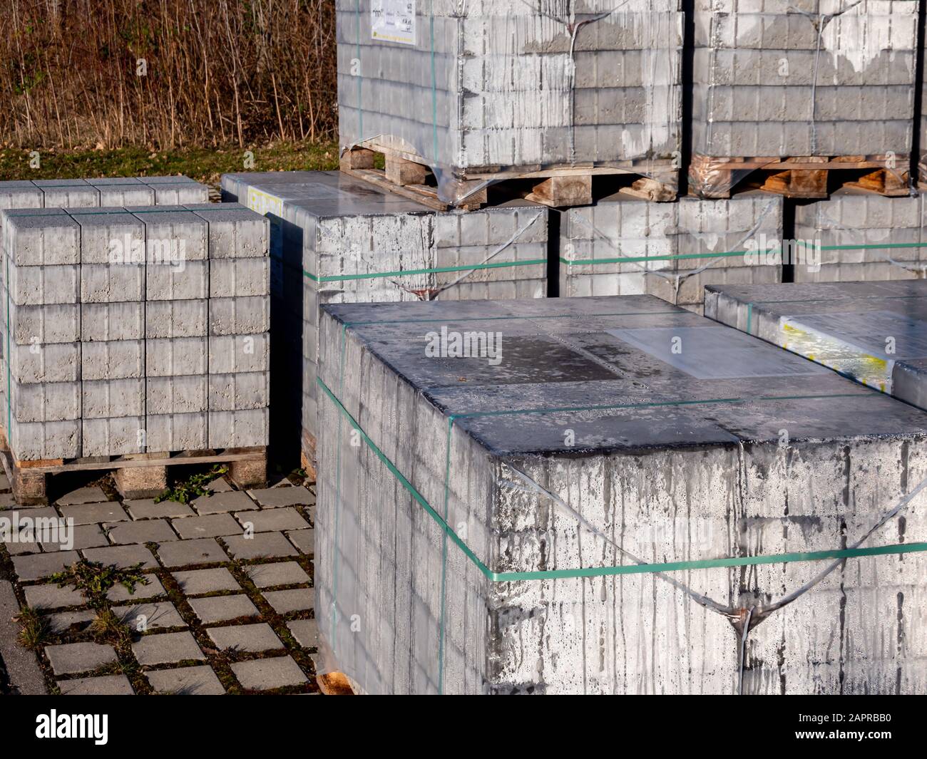 Concrete blocks building material for path construction Stock Photo - Alamy