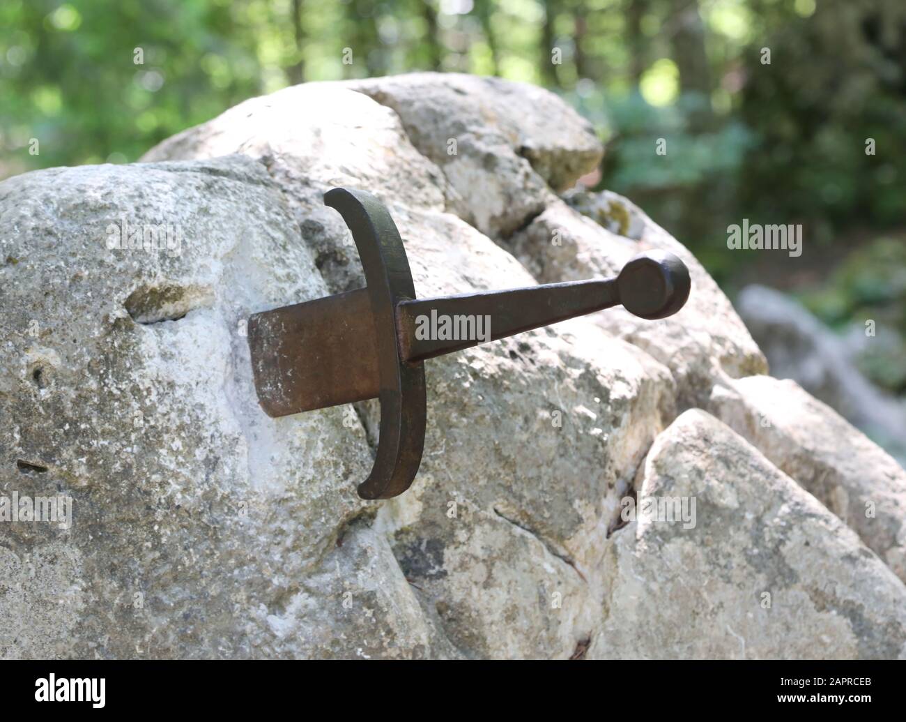 famous King Arthur sword called Excalibur stuck in the rock in the ...