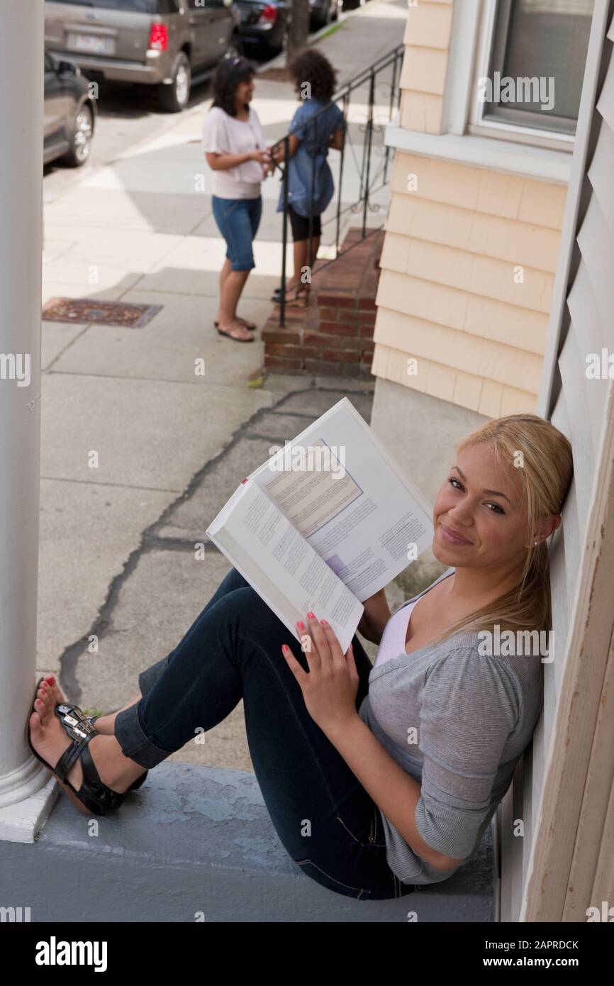 Leaning on post reading hi-res stock photography and images - Alamy