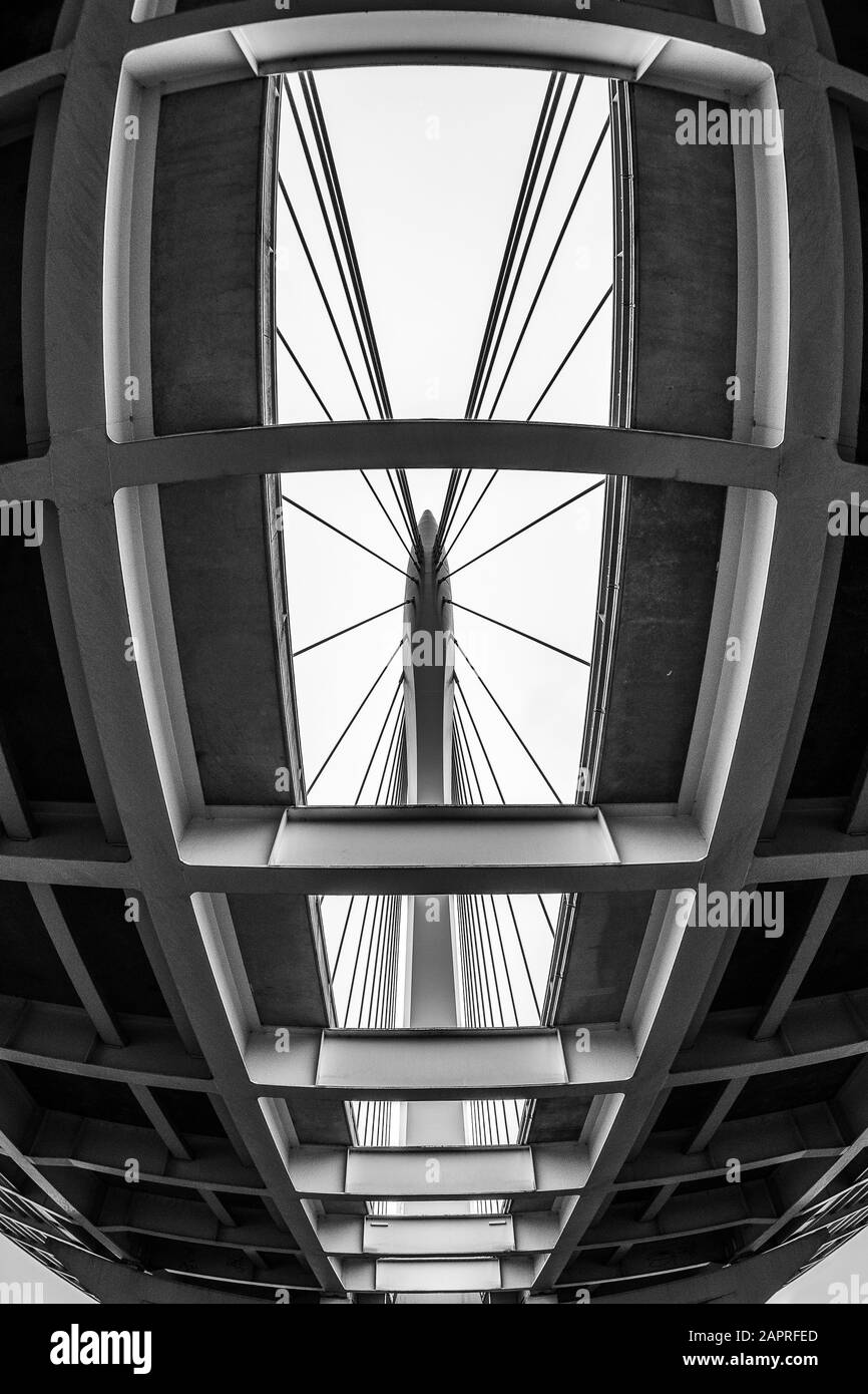 Amazing grayscale shot under two roads on a bridge Stock Photo - Alamy