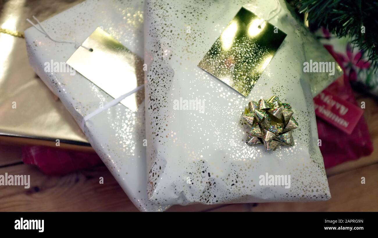 A pile of unopened Christmas gifts Stock Photo - Alamy