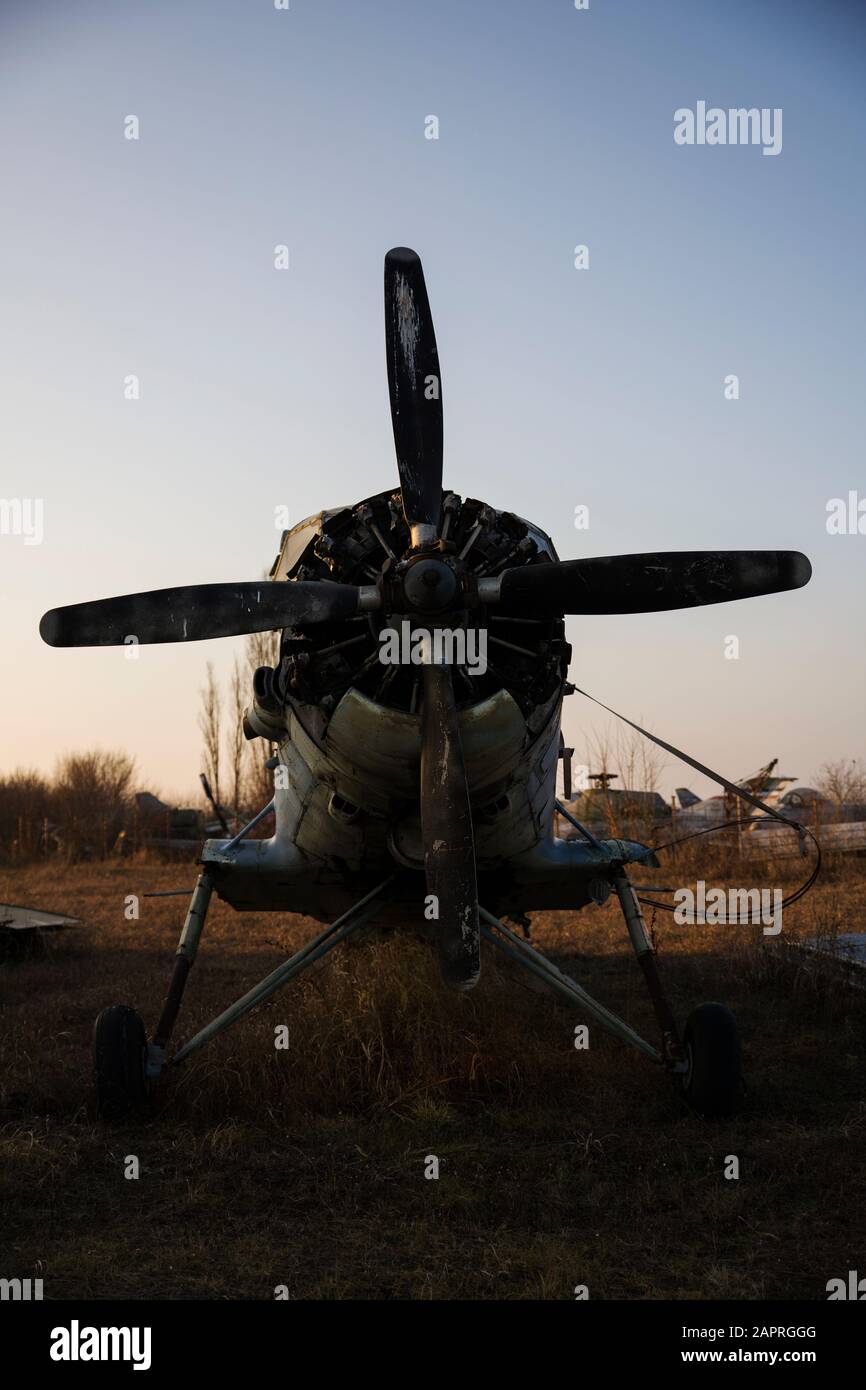 Old Rusted Propeller Airplane Abandoned in Junkyard at the Airport ...