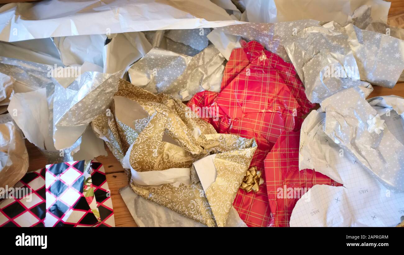Piles of used gift wrapping paper Stock Photo - Alamy