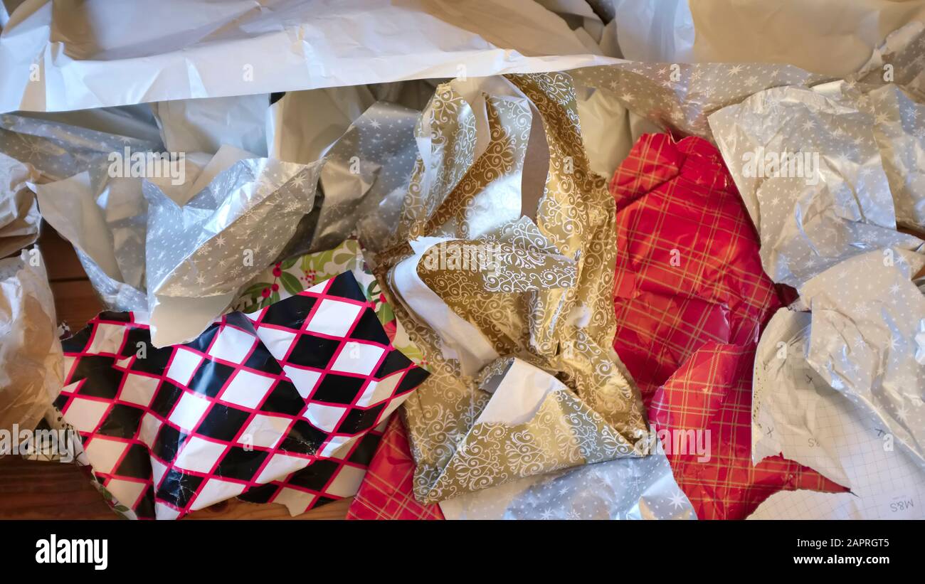Piles of used gift wrapping paper Stock Photo - Alamy