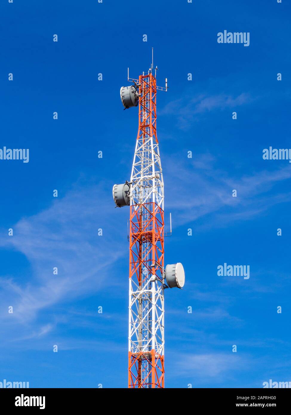 Vertical low angle shot of telecommunication tower under the beautiful ...