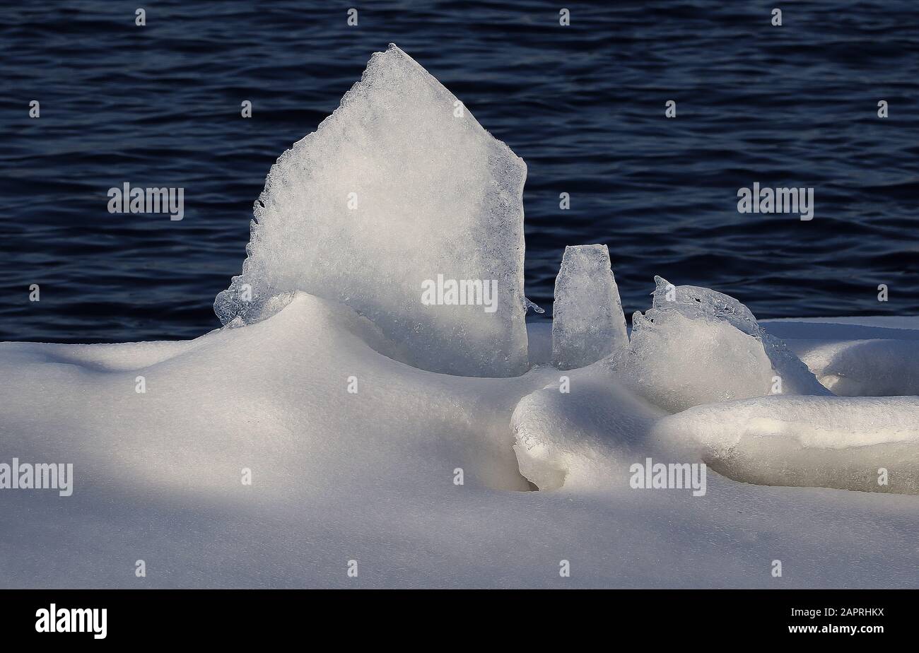 Snow , ice , and blue water natural design Stock Photo - Alamy
