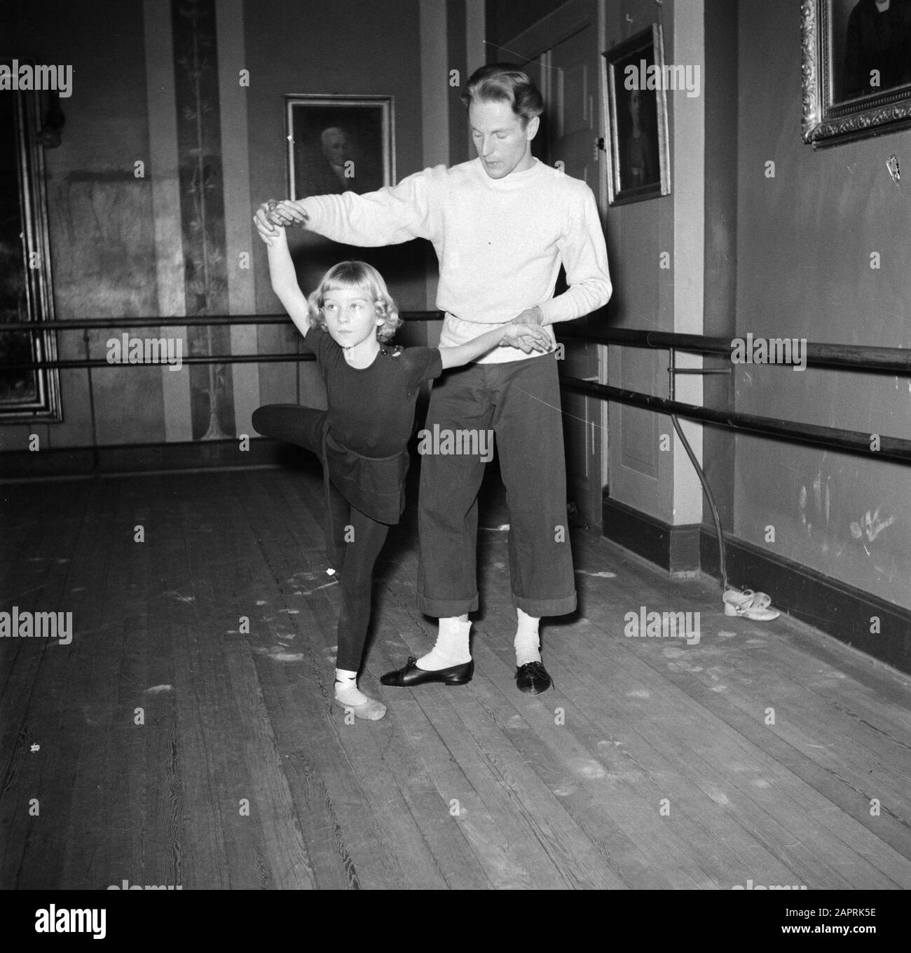 Training of the Royal Danish Ballet Teacher corrects and helps a girl ...