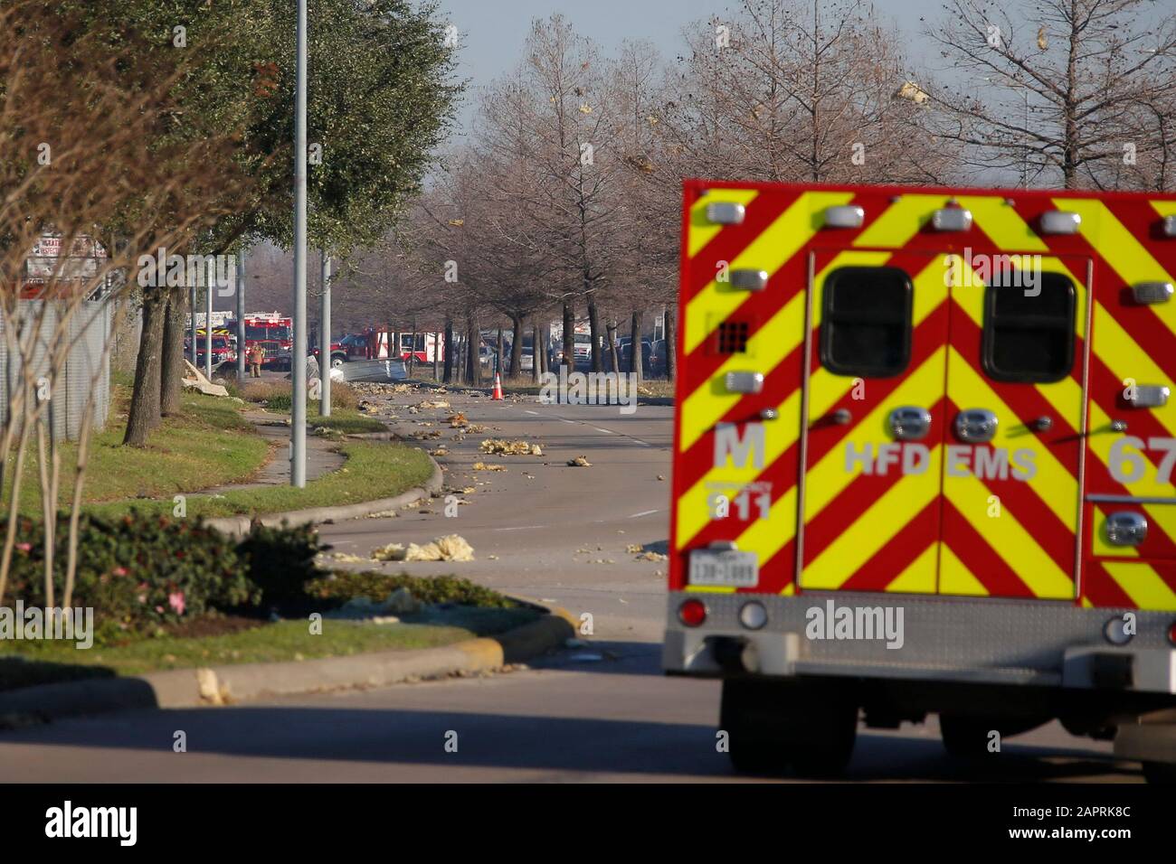 Houston, USA. 24th Jan, 2020. Fire trucks are seen near an explosion ...
