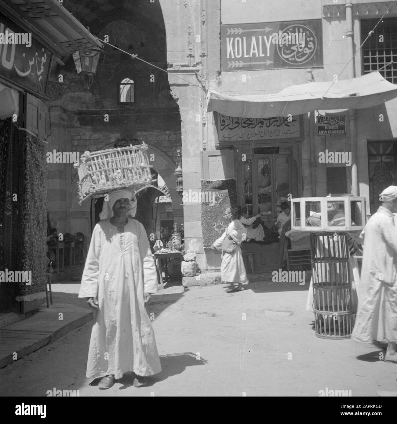 Middle East 1950-1955: Egypt Look through the suq of Cairo. Man with a ...