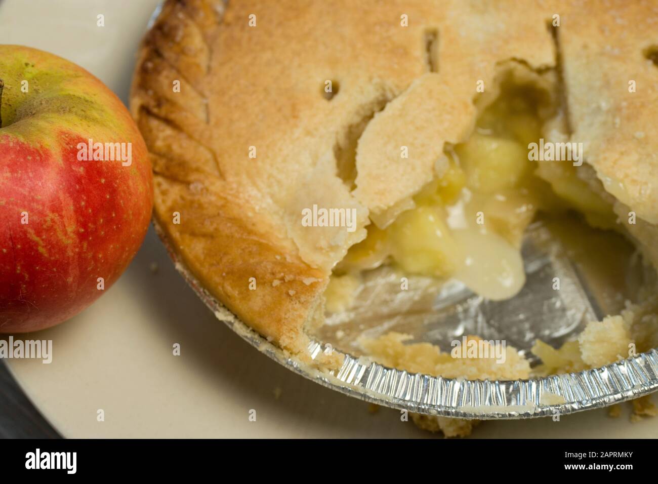 Overhead shot of a sliced creamy pie full of fruits Stock Photo - Alamy