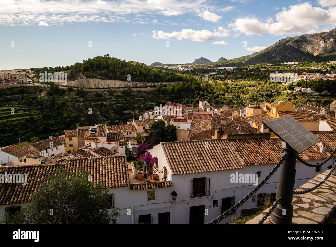 Bird's eye view of a beautiful city of Polop in Spain with mountains in ...