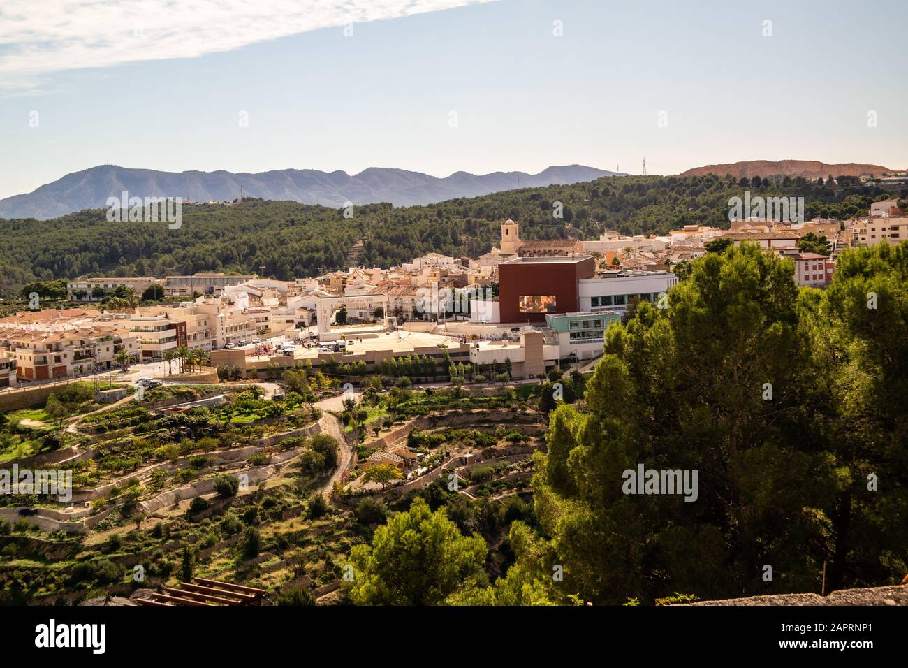 Bird's eye view of a beautiful Polop city in Spain with mountains in a ...