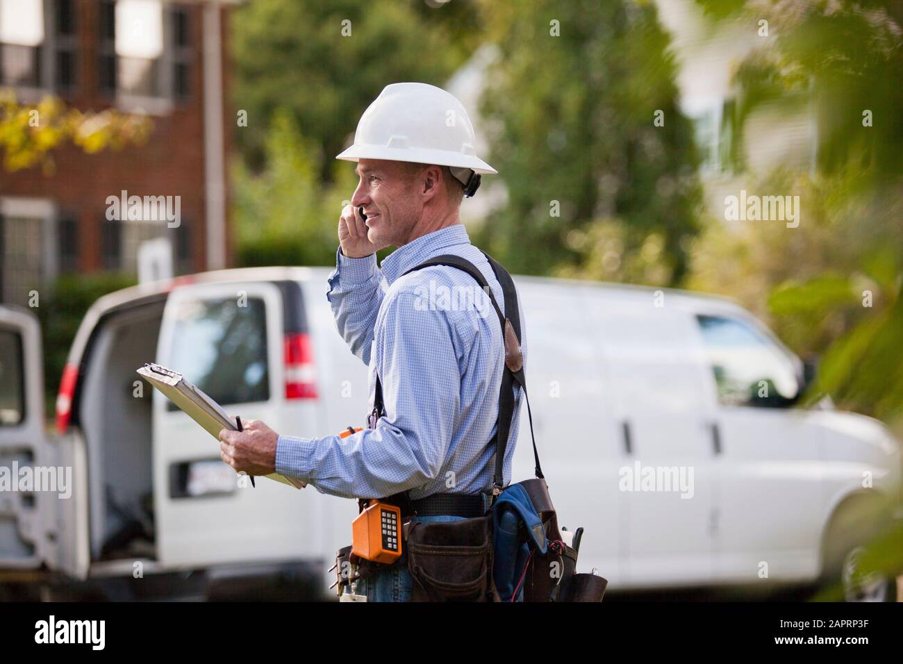 Electrician engineer talking on cell hi-res stock photography and ...