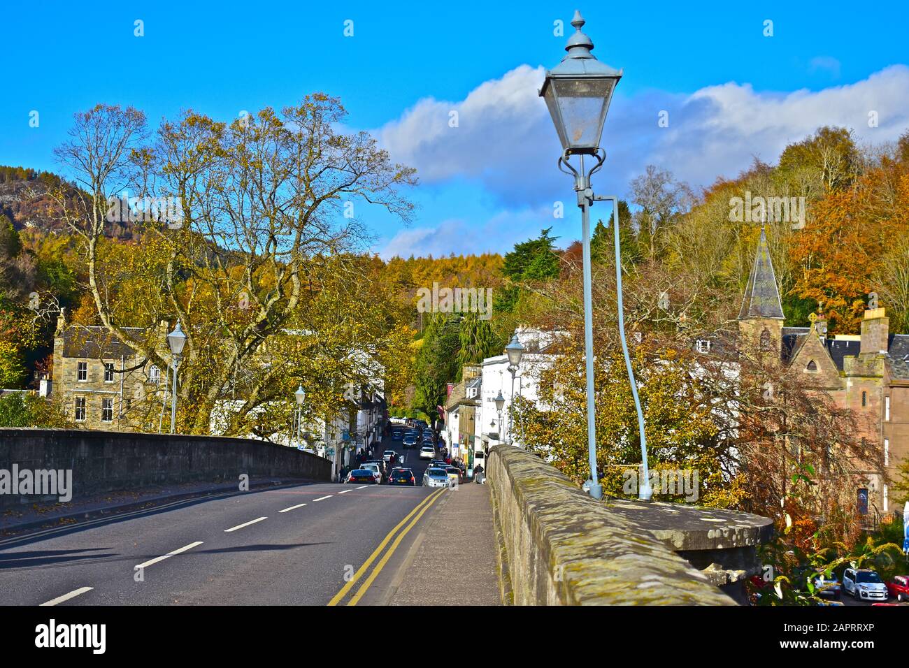 A wonderful view from the bridge over the river Tay in Dunkeld, showing ...