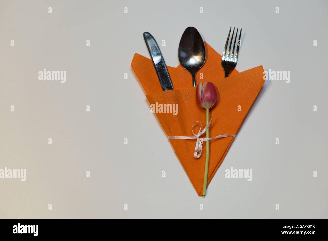 spring-like cutlery set with fork, knife and spoon Stock Photo - Alamy