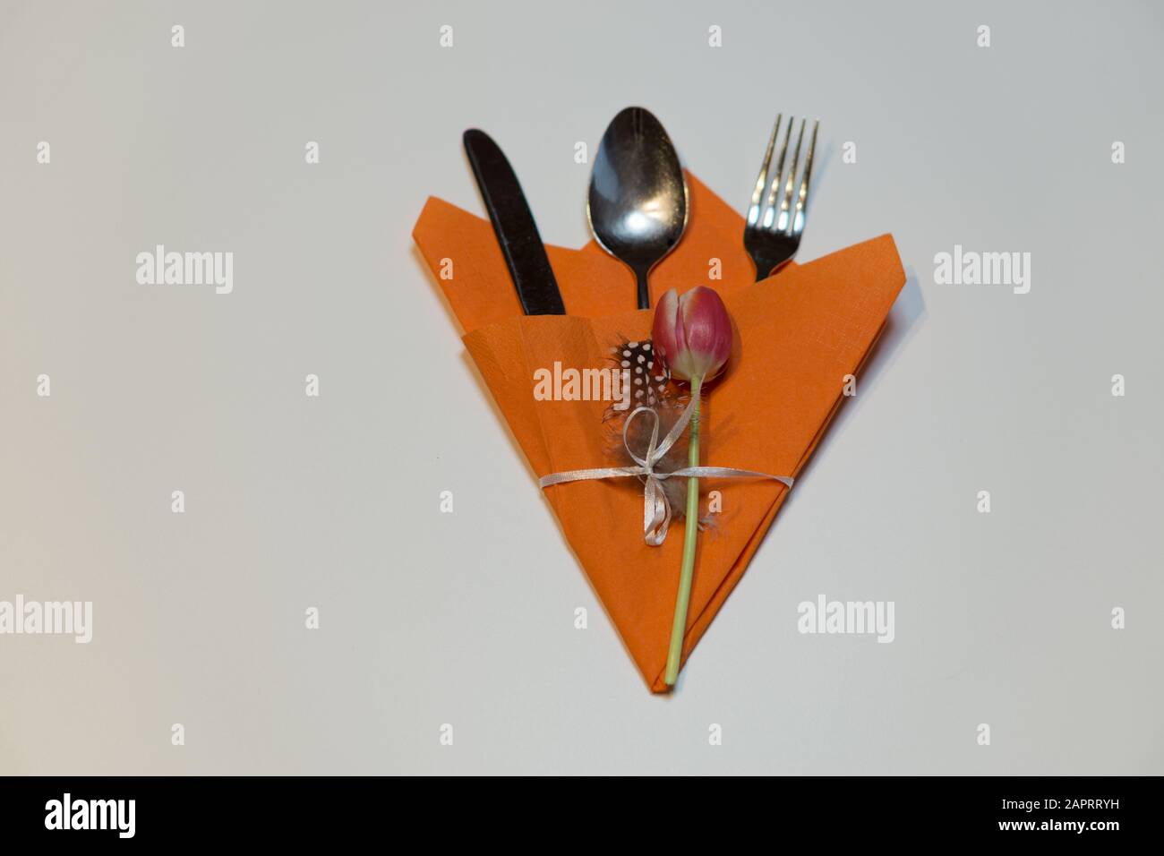spring-like cutlery set with fork, knife and spoon Stock Photo - Alamy