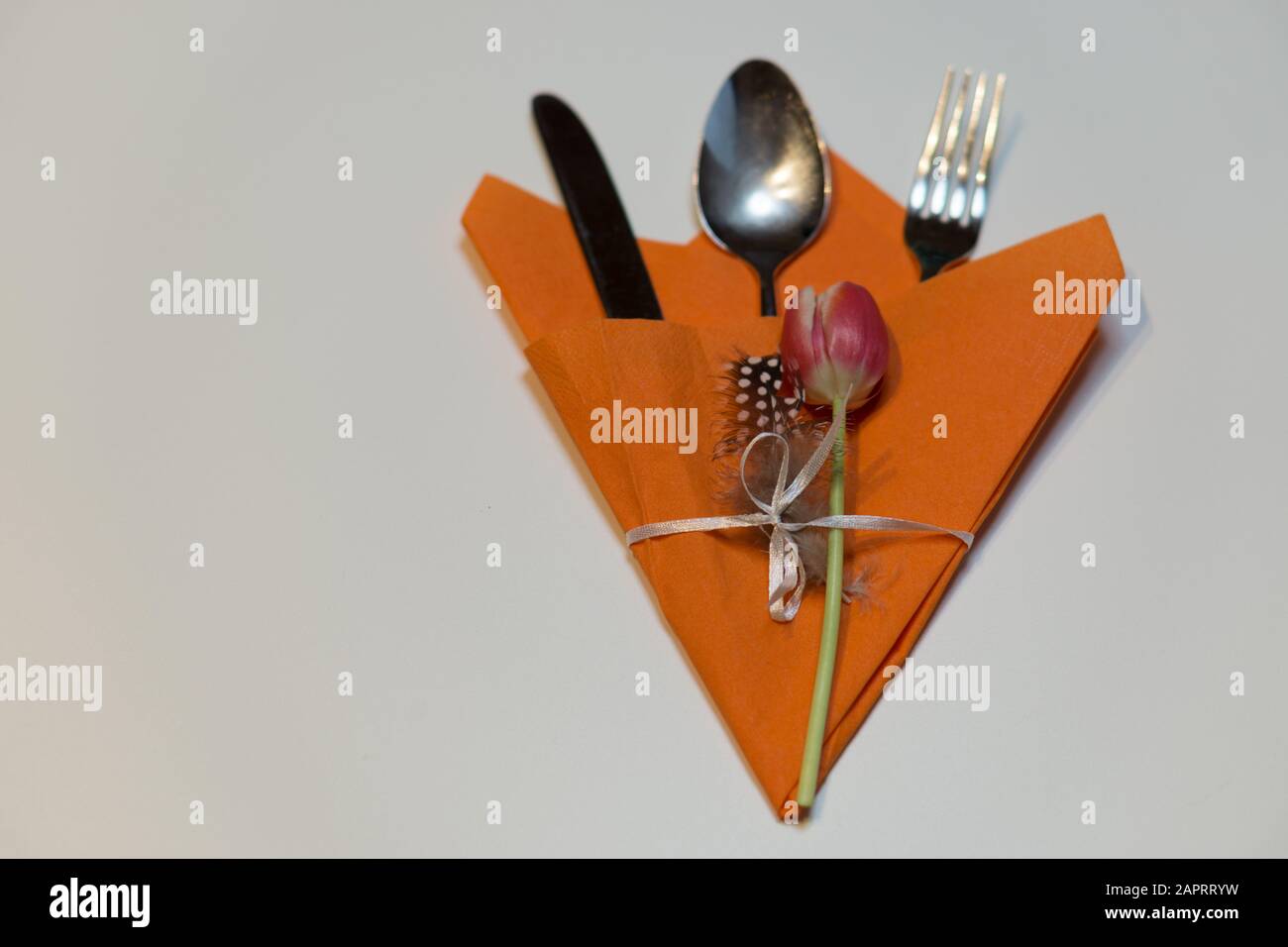 spring-like cutlery set with fork, knife and spoon Stock Photo - Alamy