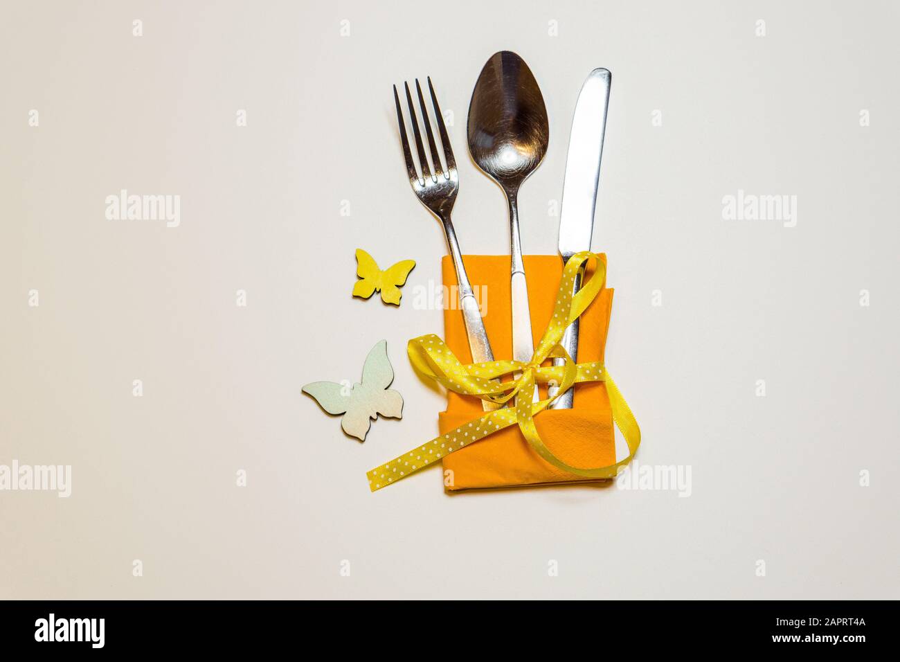 spring-like cutlery set with fork, knife and spoon Stock Photo - Alamy