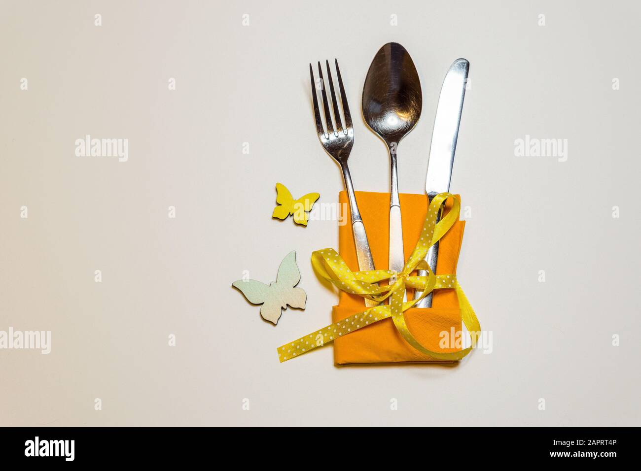 spring-like cutlery set with fork, knife and spoon Stock Photo - Alamy