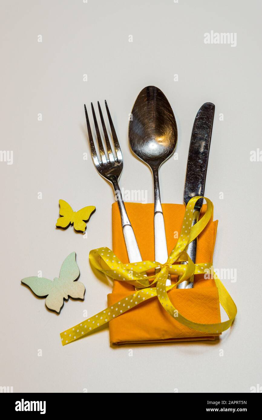 spring-like cutlery set with fork, knife and spoon Stock Photo - Alamy