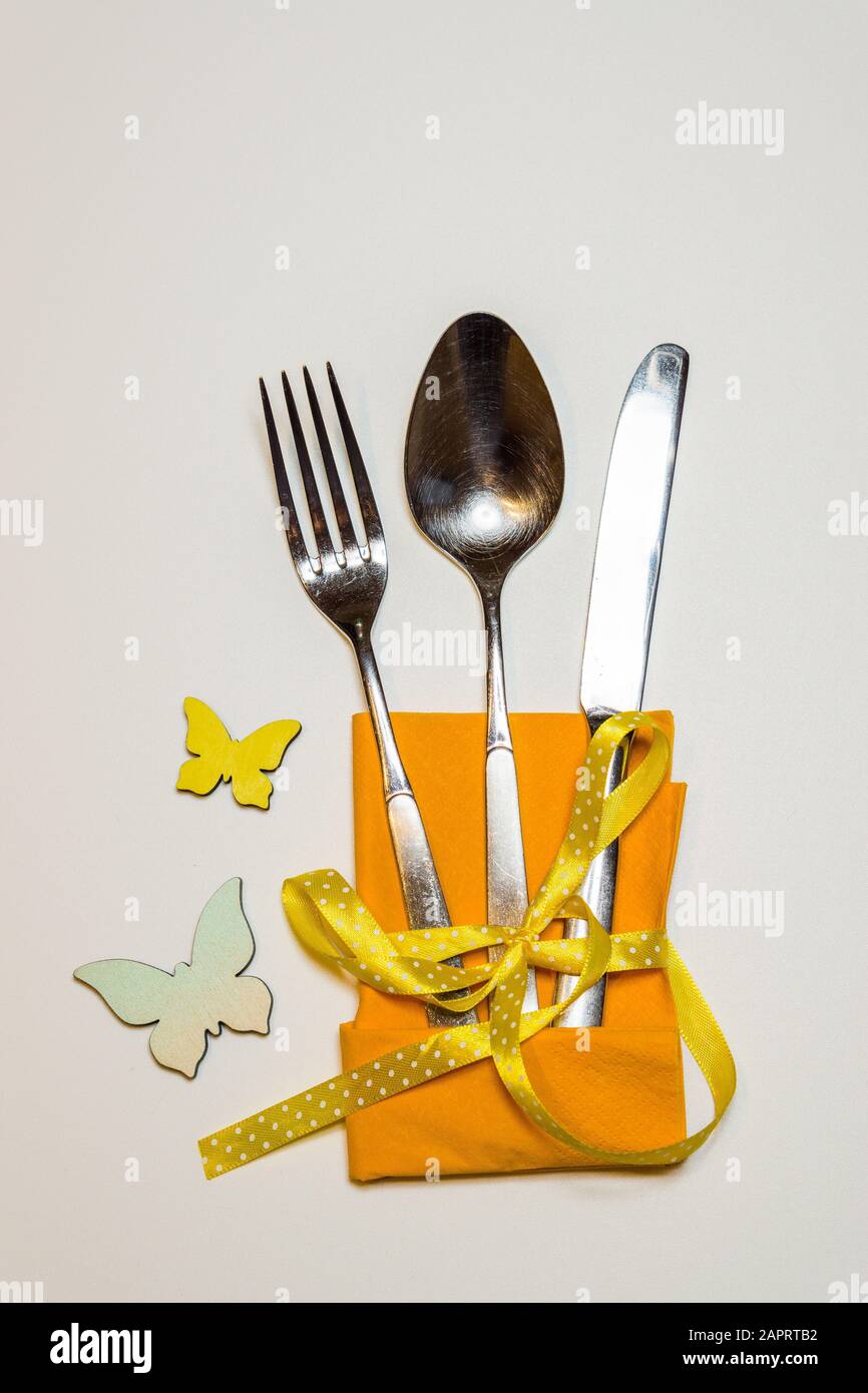spring-like cutlery set with fork, knife and spoon Stock Photo - Alamy