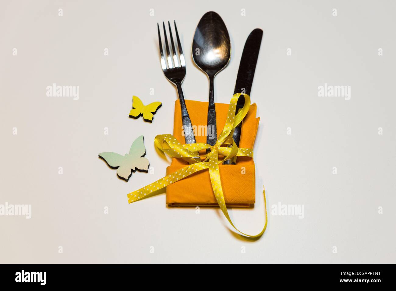 spring-like cutlery set with fork, knife and spoon Stock Photo - Alamy