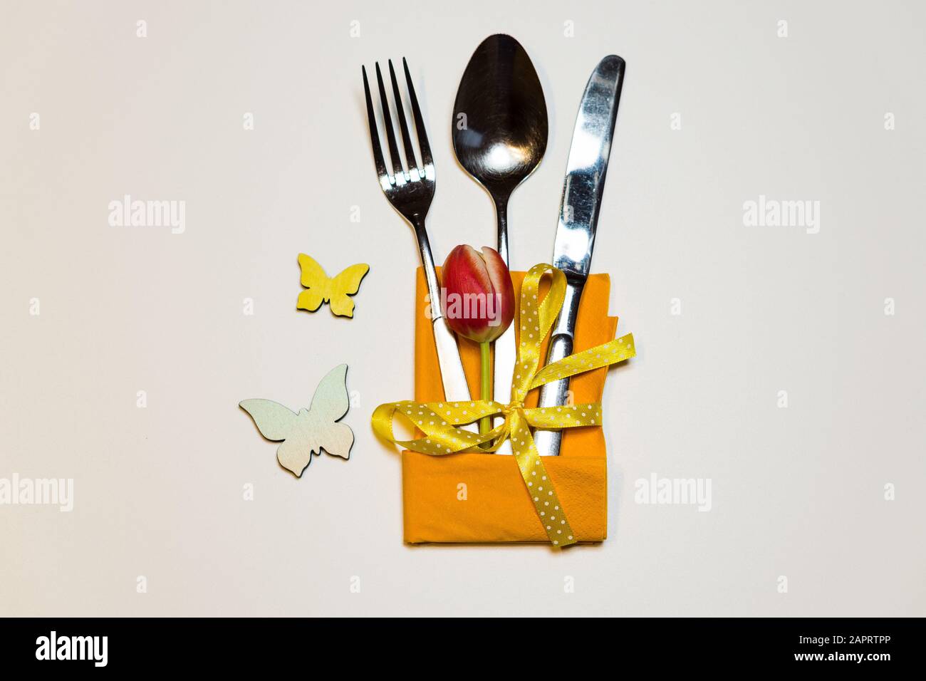 spring-like cutlery set with fork, knife and spoon Stock Photo - Alamy