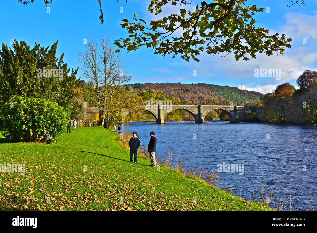 A beautiful Autumn view of the River Tay at Dunkeld, where it passes ...