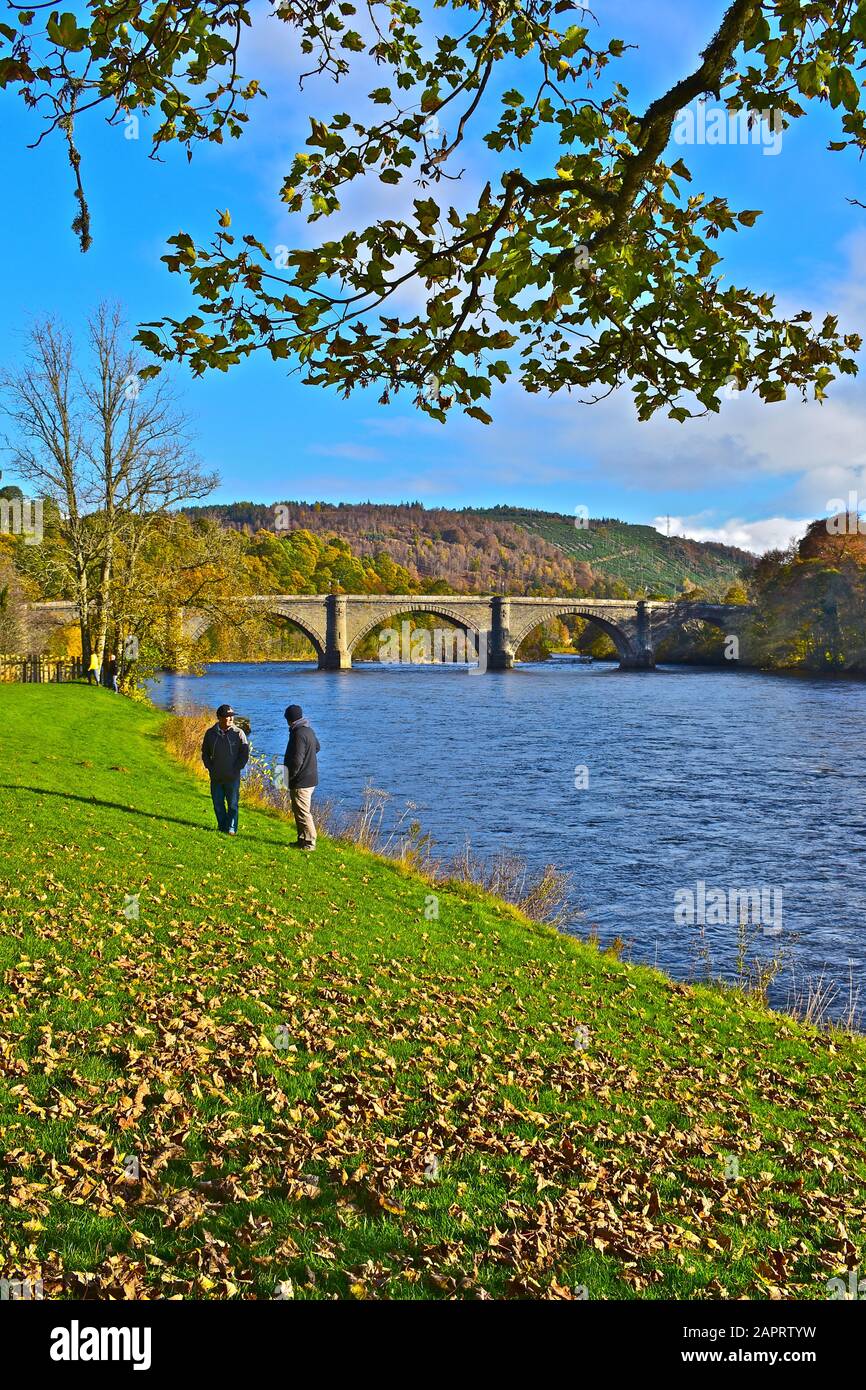 A beautiful Autumn view of the River Tay at Dunkeld, where it passes ...