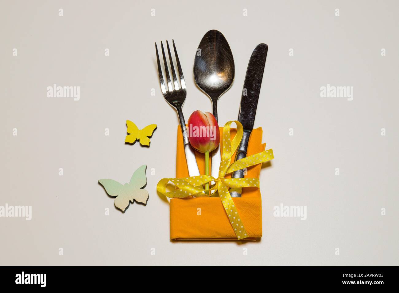 spring-like cutlery set with fork, knife and spoon Stock Photo - Alamy