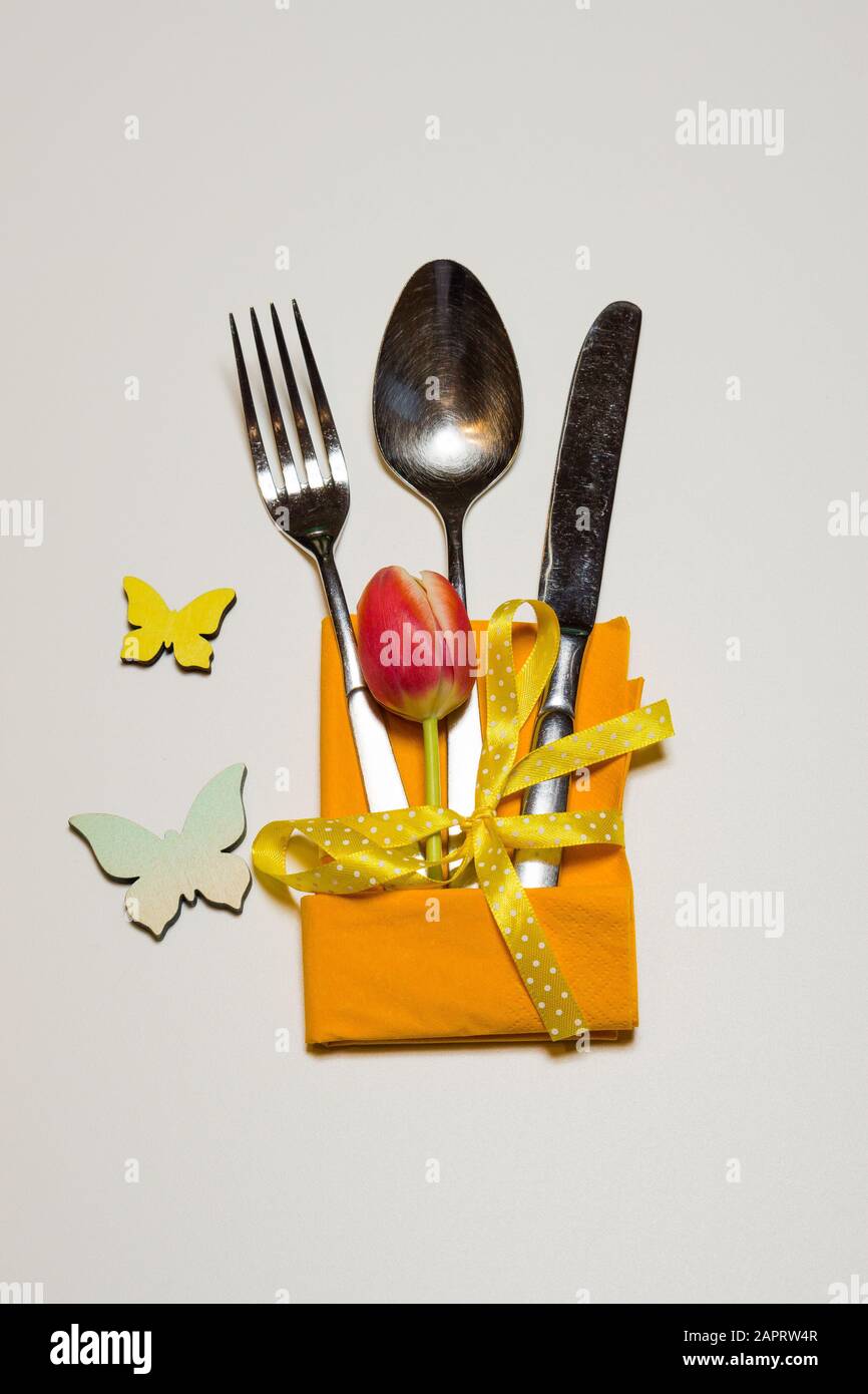 spring-like cutlery set with fork, knife and spoon Stock Photo - Alamy