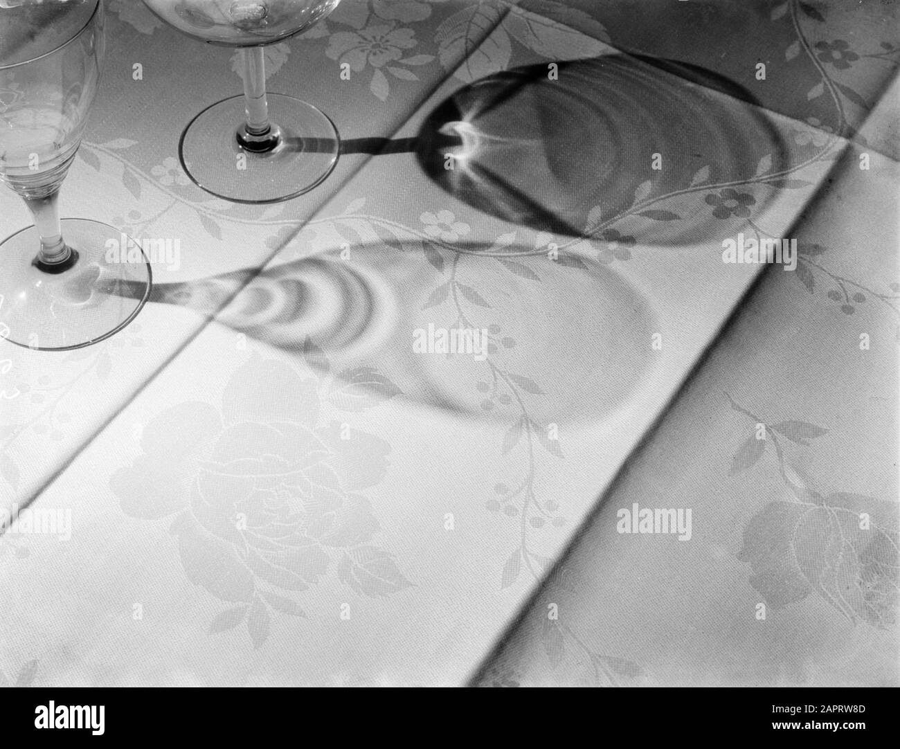 Advertising photography A set table with glasses casting a shadow on ...
