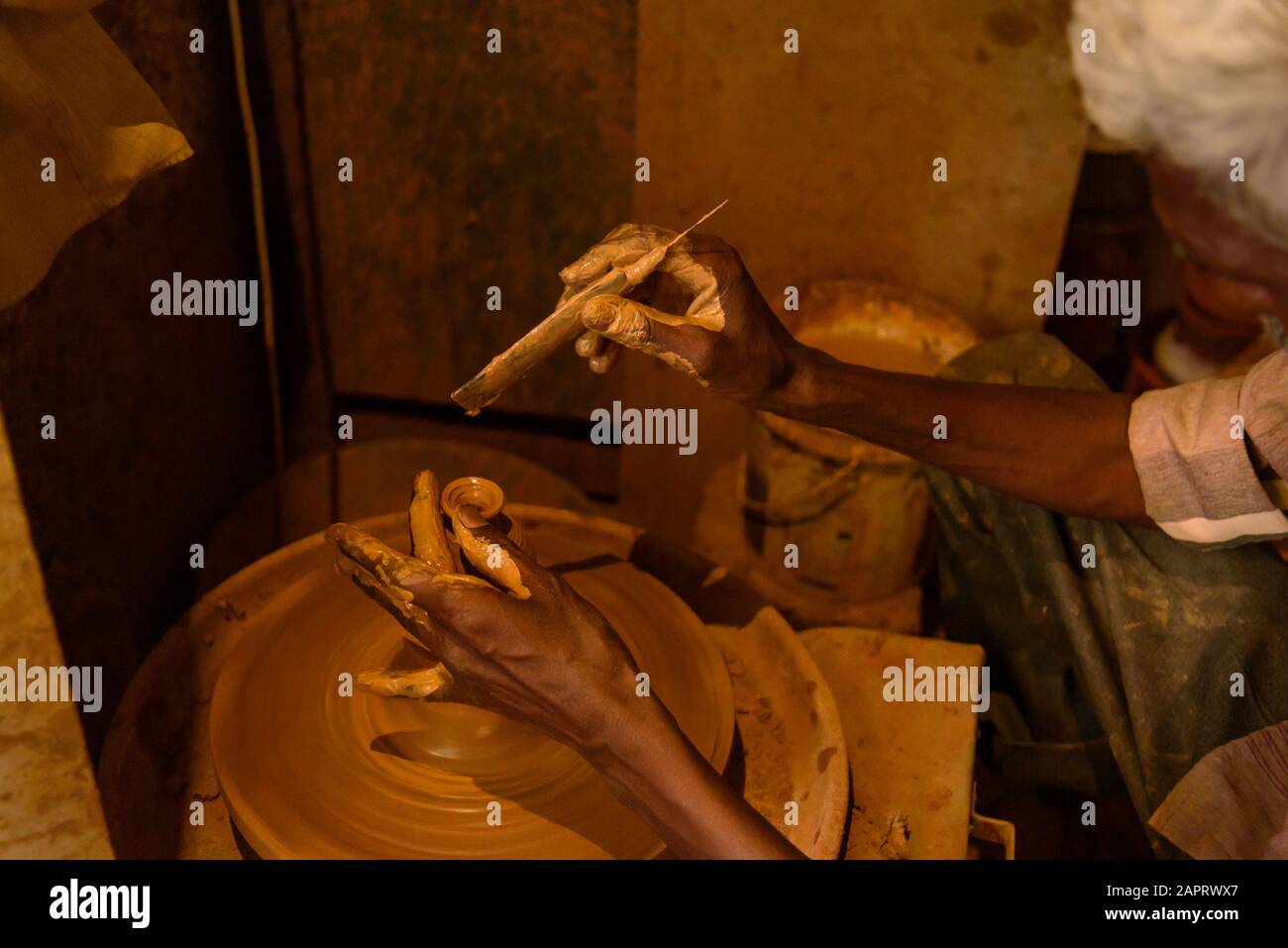 Indian potter making clay pots on pottery wheel in Pottery town is old ...