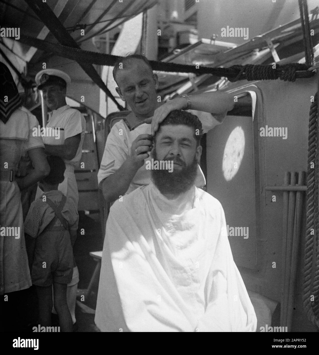 A naval man with beard is cut aboard the m.s. princess Margriet Date ...
